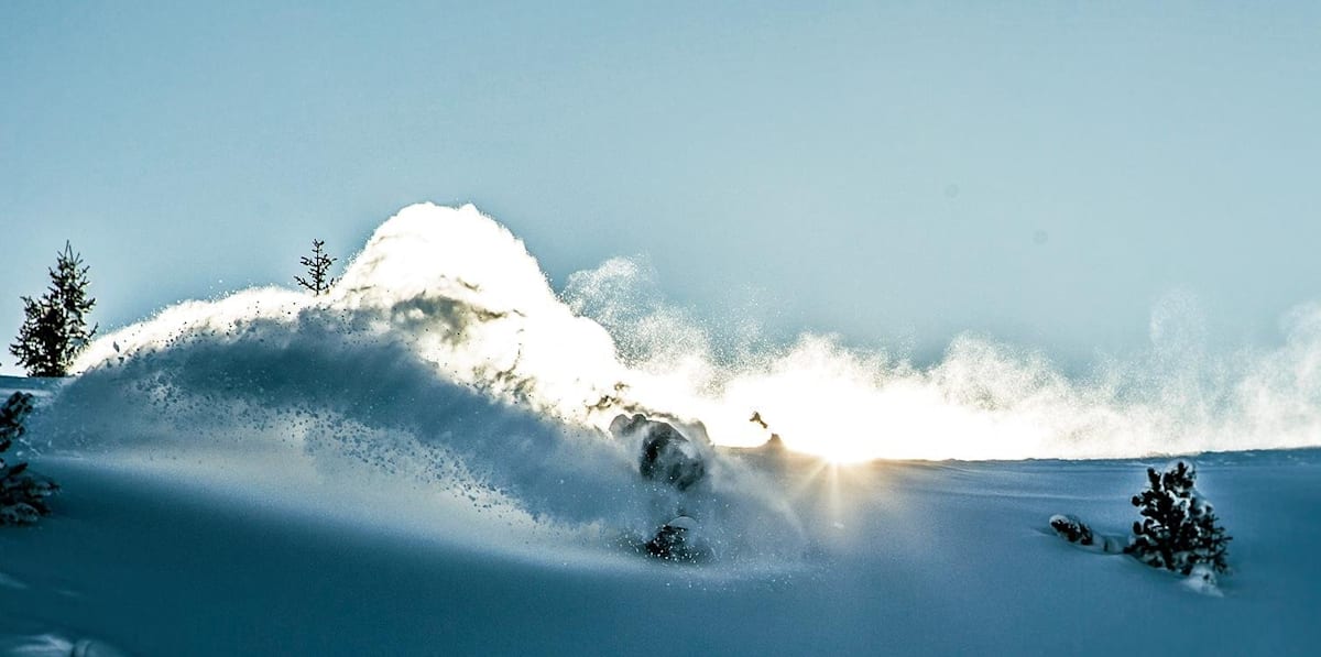 Marko Grilc and Werni Stock riding powder in Zillertal