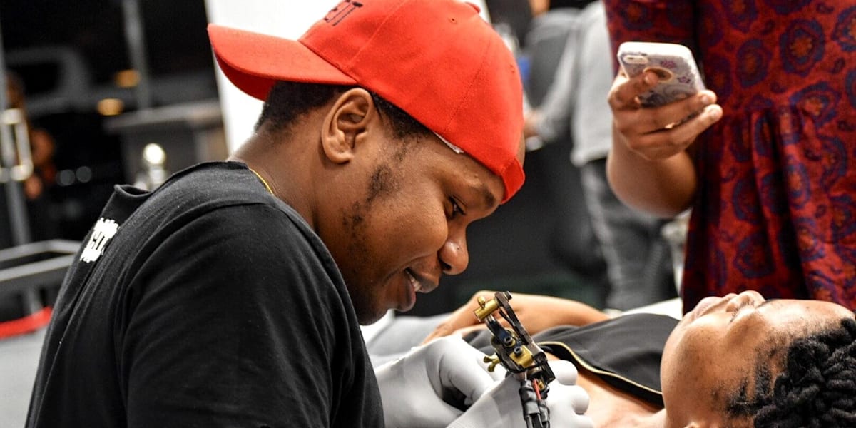 In City Ink tattoo shop and social leader ++video++