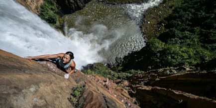 Climbing Howick Falls in flood