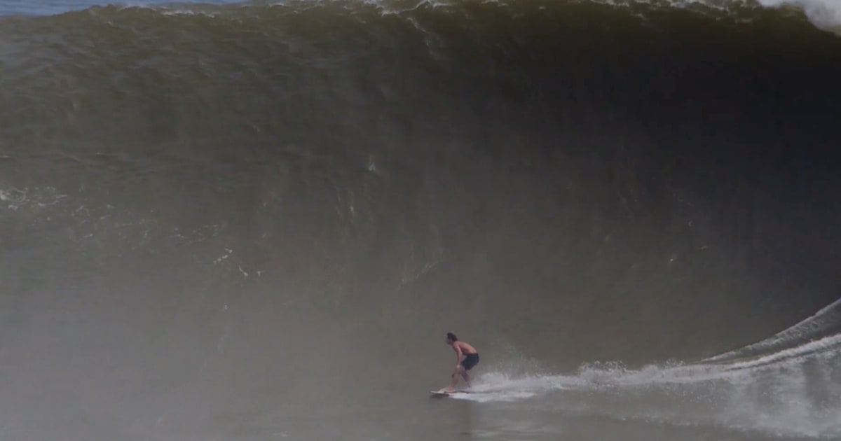 Brad Domke surfing XXL waves on skimboard