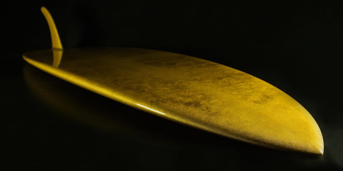 Aureus: la tabla de surf de oro