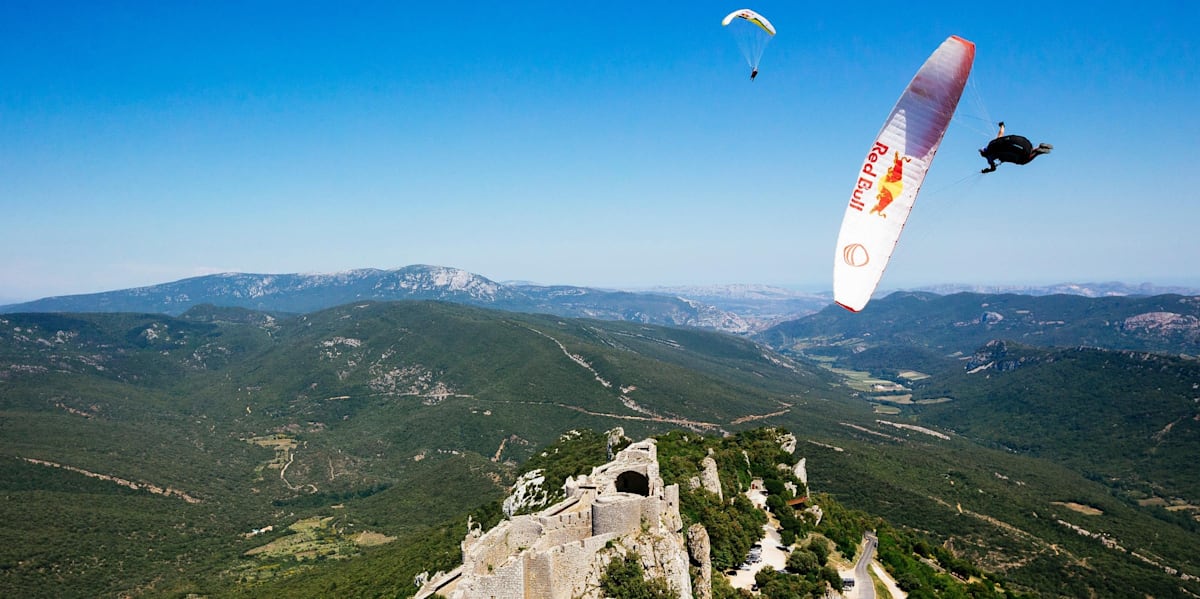 Watch paragliders and wingsuits attack a castle