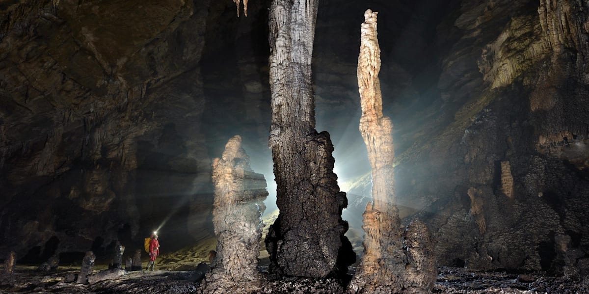 Photos: exploring giant caves in China