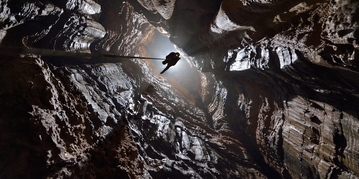 Photos: exploring giant caves in China