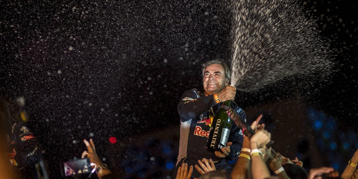 Celebrations on the final podium of the Dakar 2018