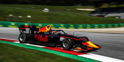 How does a Formula 2 driver incorporate simulator racing into his training?