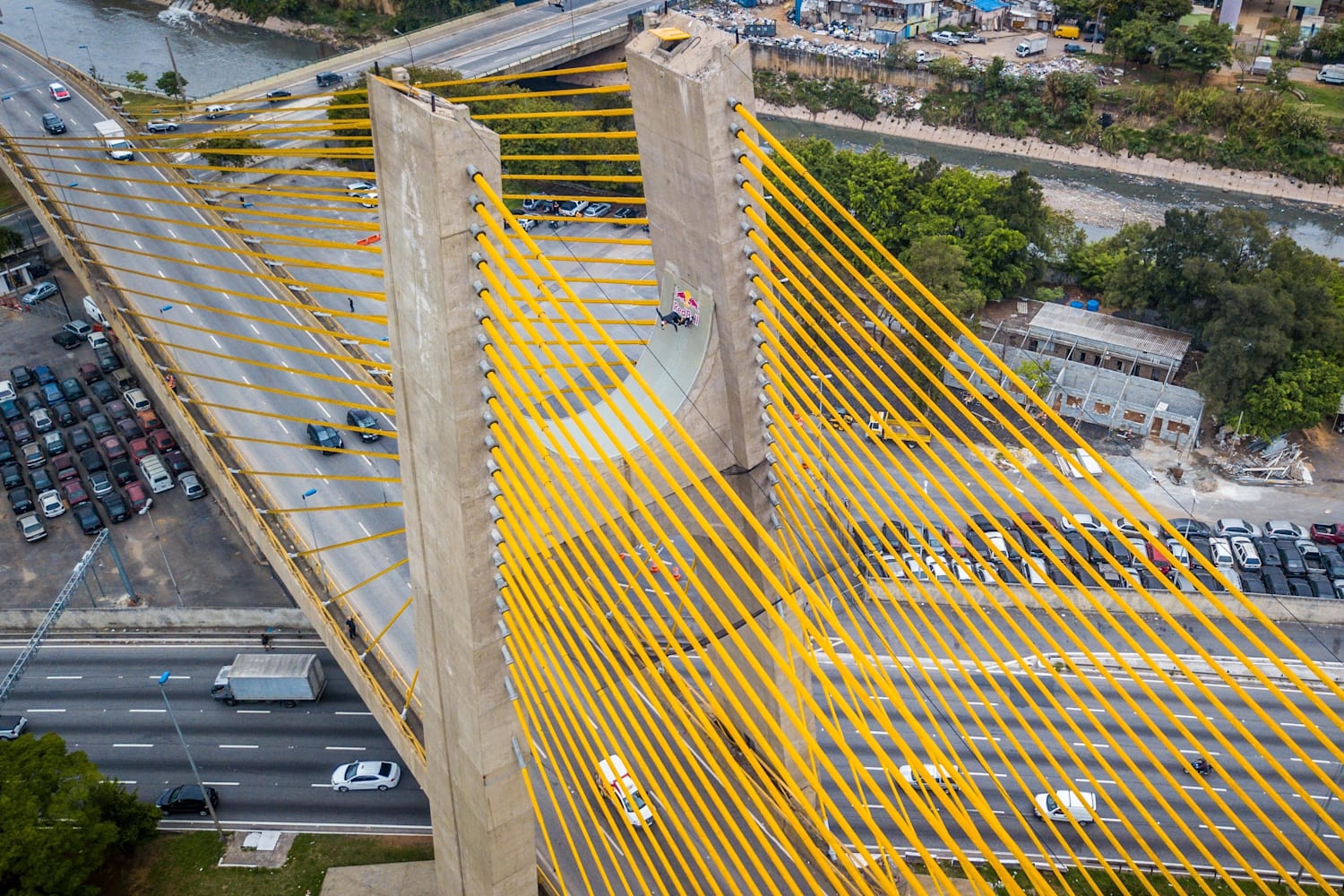 Skater Sandro Dias rides halfpipe on 45m bridge – video