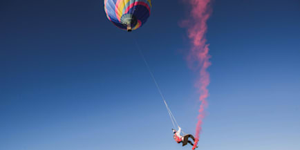 *Video* Watch skydivers play on a hot air balloon swing