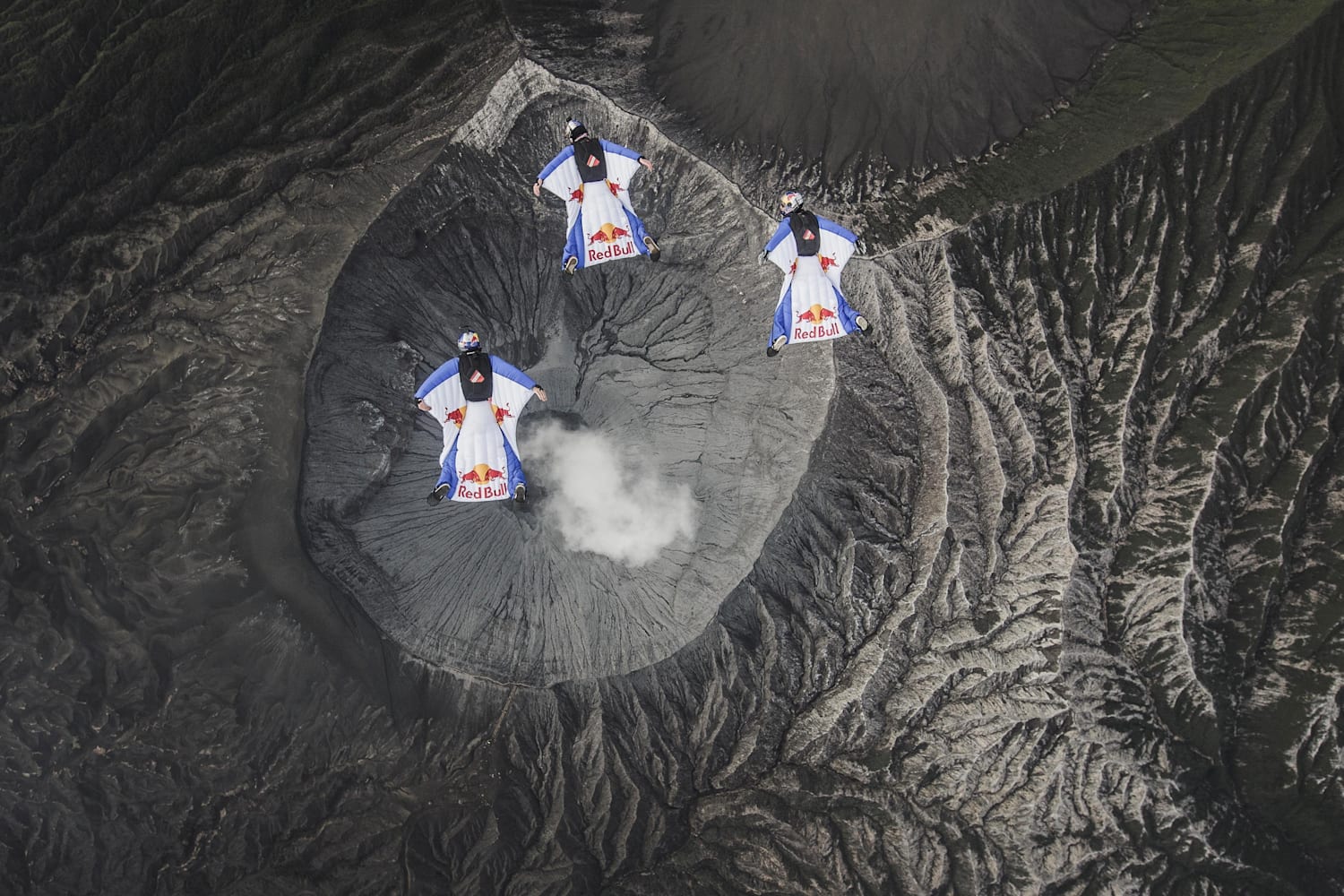 Red Bull Sky Dive Team fly over a volcano in Indonesia