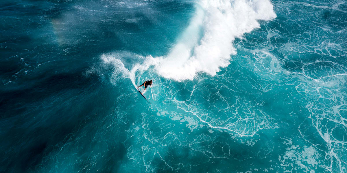 Big wave surf training: 4 ways to step up your game