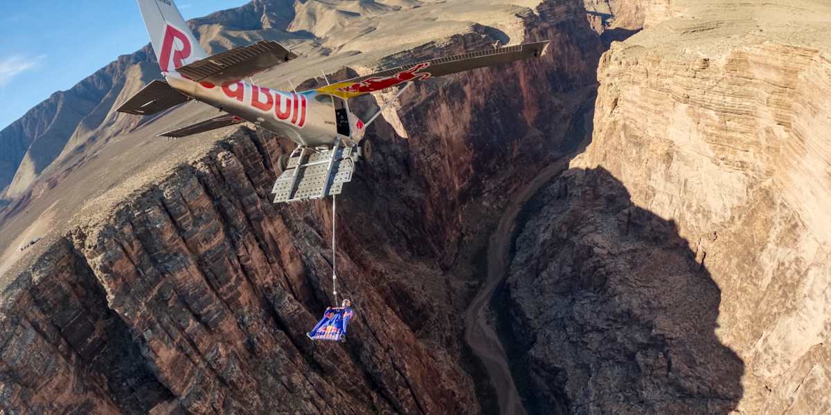 World's first: Skydiver Max Manow pulled by a plane