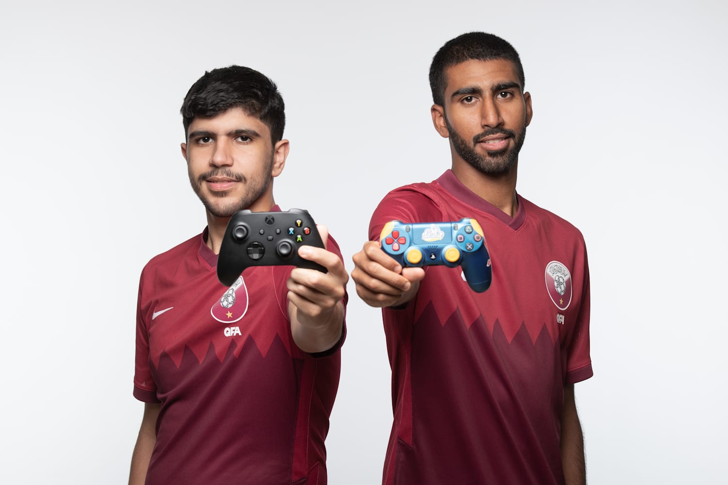 Ahmad Al-Meghessib and Jassim Eid Lead Qatar