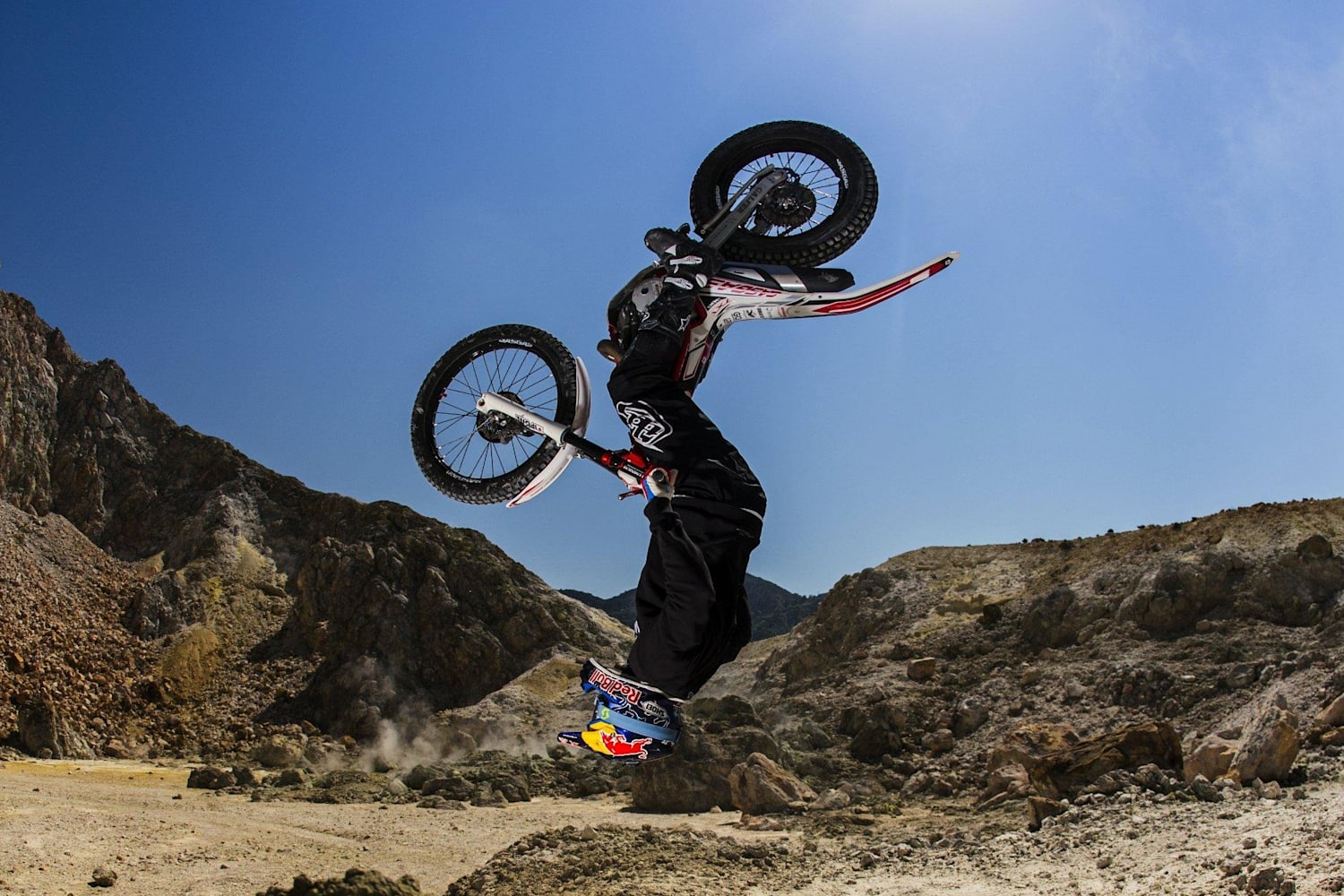 Julien Dupont rides a motorbike into a volcano
