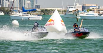 F1 drivers Ricciardo and Tsunoda race mini jet boats
