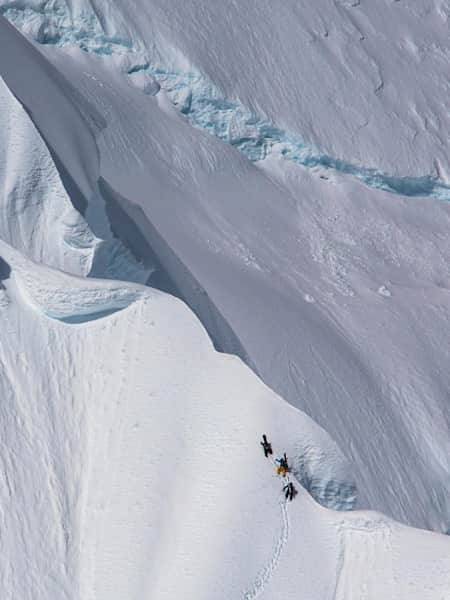 Snowboarder Xavier De Le Rue on riding fast and steep