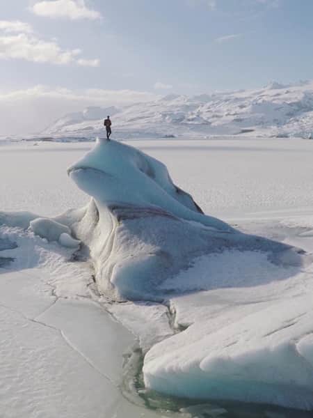 Watch as this guy explores an iceberg by running