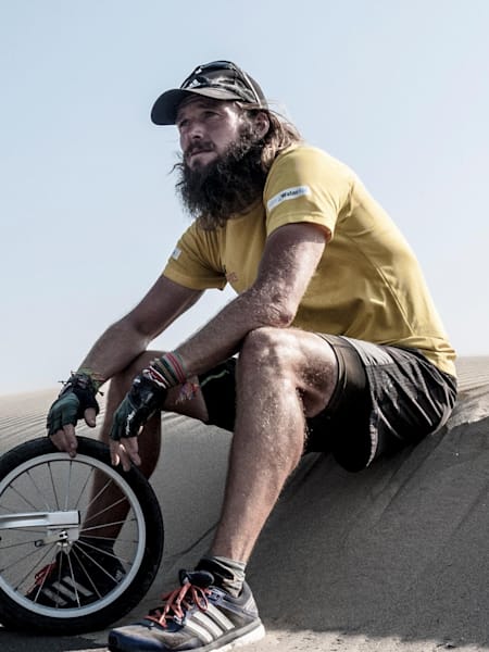 One day, he left his desk and ran...17,000km