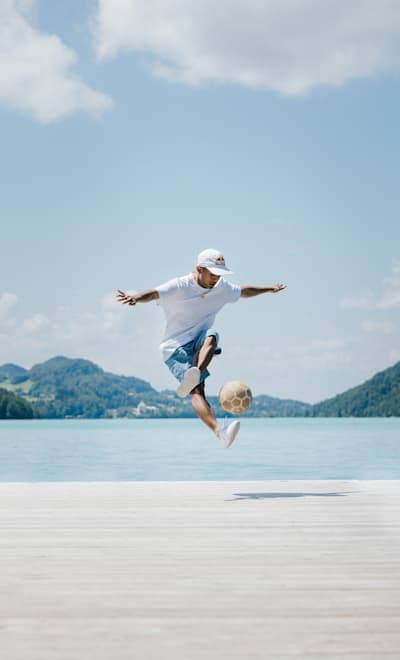 Hazim Ahmad shows off a trick on the shores of Austria's Fuschlsee