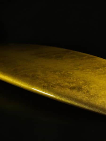 Aureus: la tabla de surf de oro