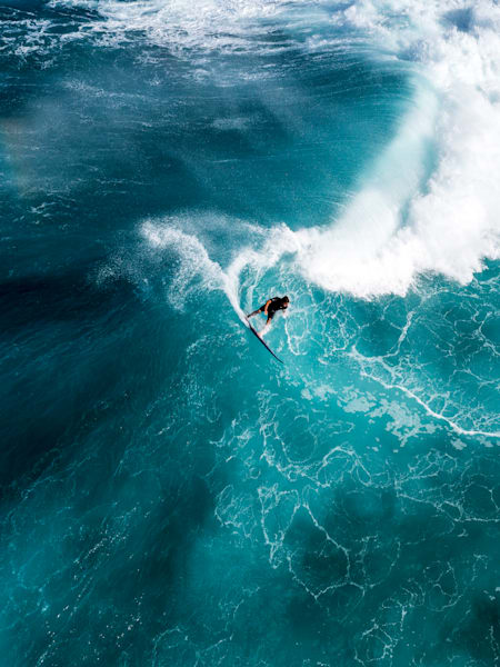 Big wave surf training: 4 ways to step up your game
