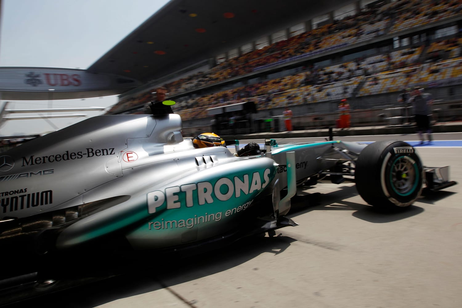 Hamilton claims first pole for Mercedes