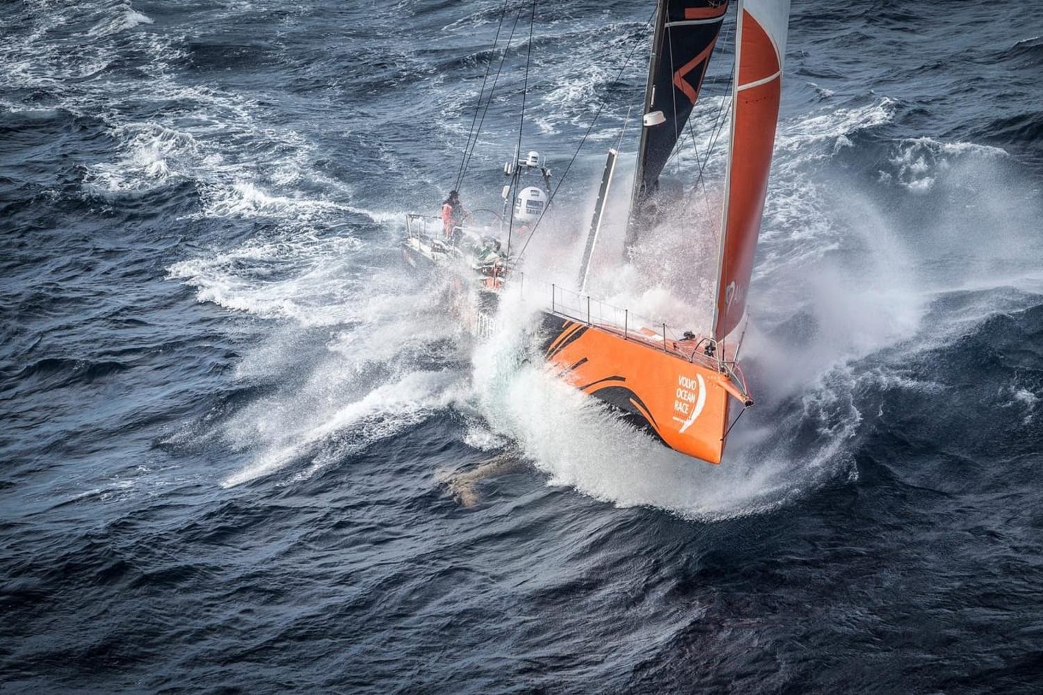 Volvo Ocean Race boats disappear between massive waves