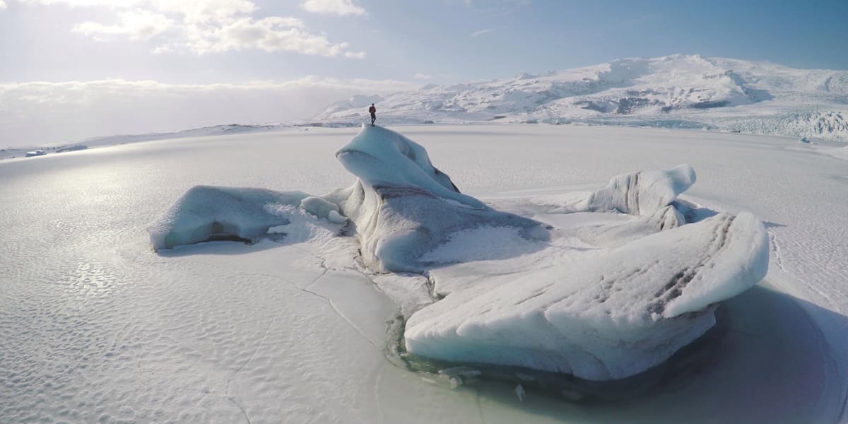 Watch as this guy explores an iceberg by running