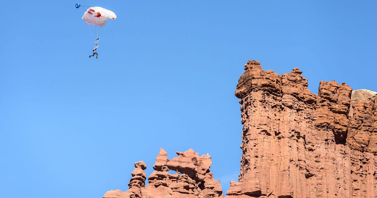 Amazing BASE Jump Off Cliff to Rock Tower Landing
