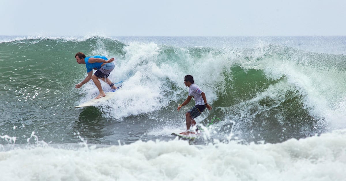 Jonty Rhodes surfs the Indian waves