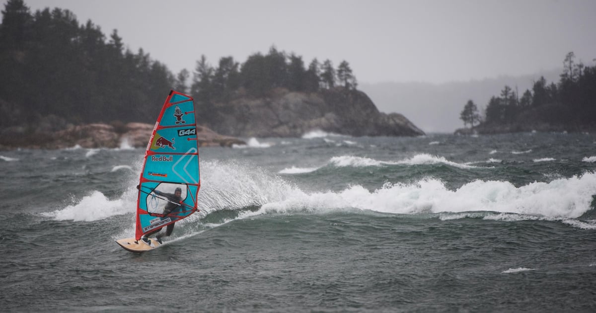 Windsurfing on Frigid, Snowy Lake Superior