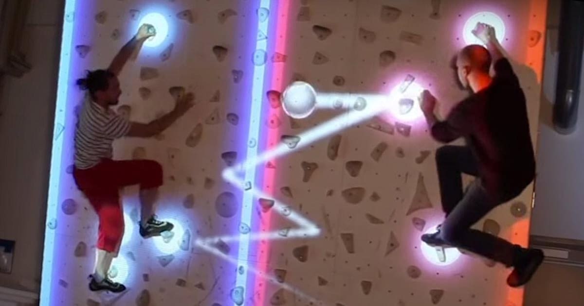 Interactive climbing wall offers 'battle' bouldering