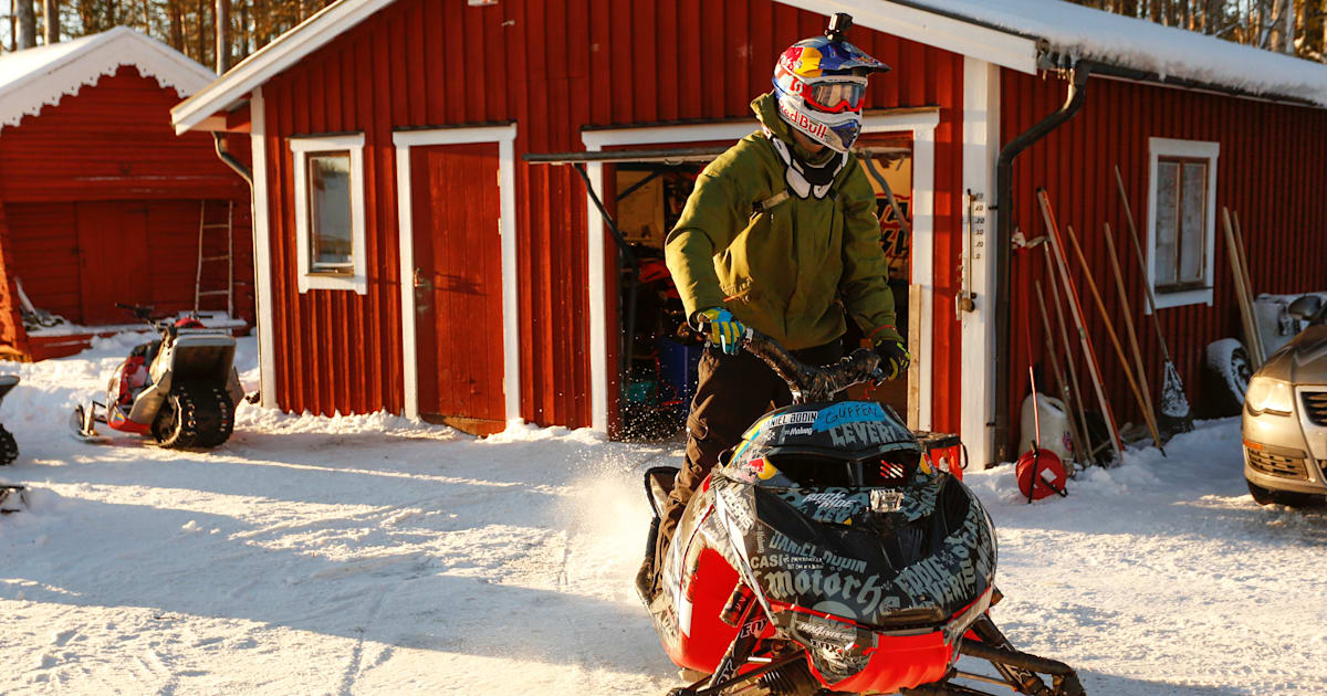 Daniel Bodin does a double backflip in a snowmobile
