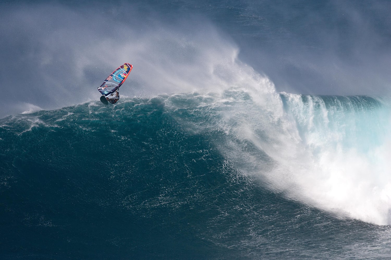 Jason Polakow windsurfing at Backyards, Oahu