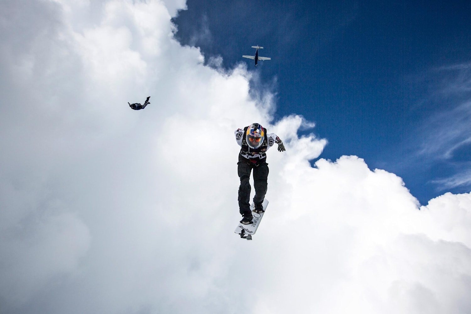 skydiving through clouds